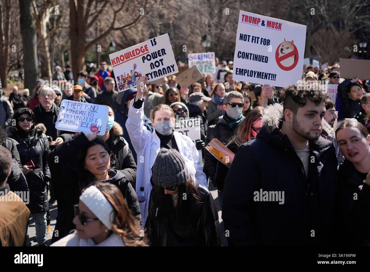 People participate in a "Stand Up for Science" rally in New York ...