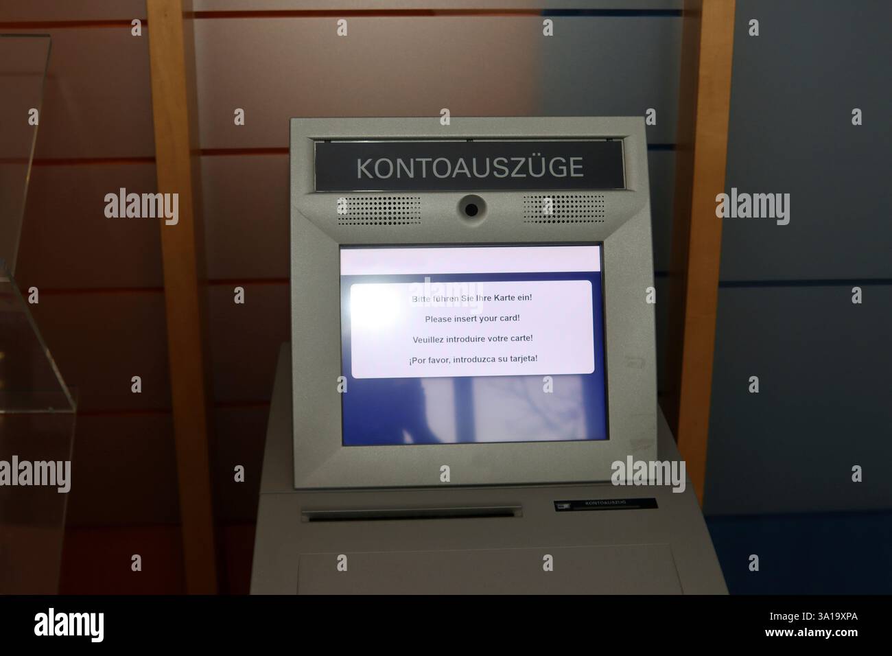 Statement printer in your bank branch Stock Photo - Alamy