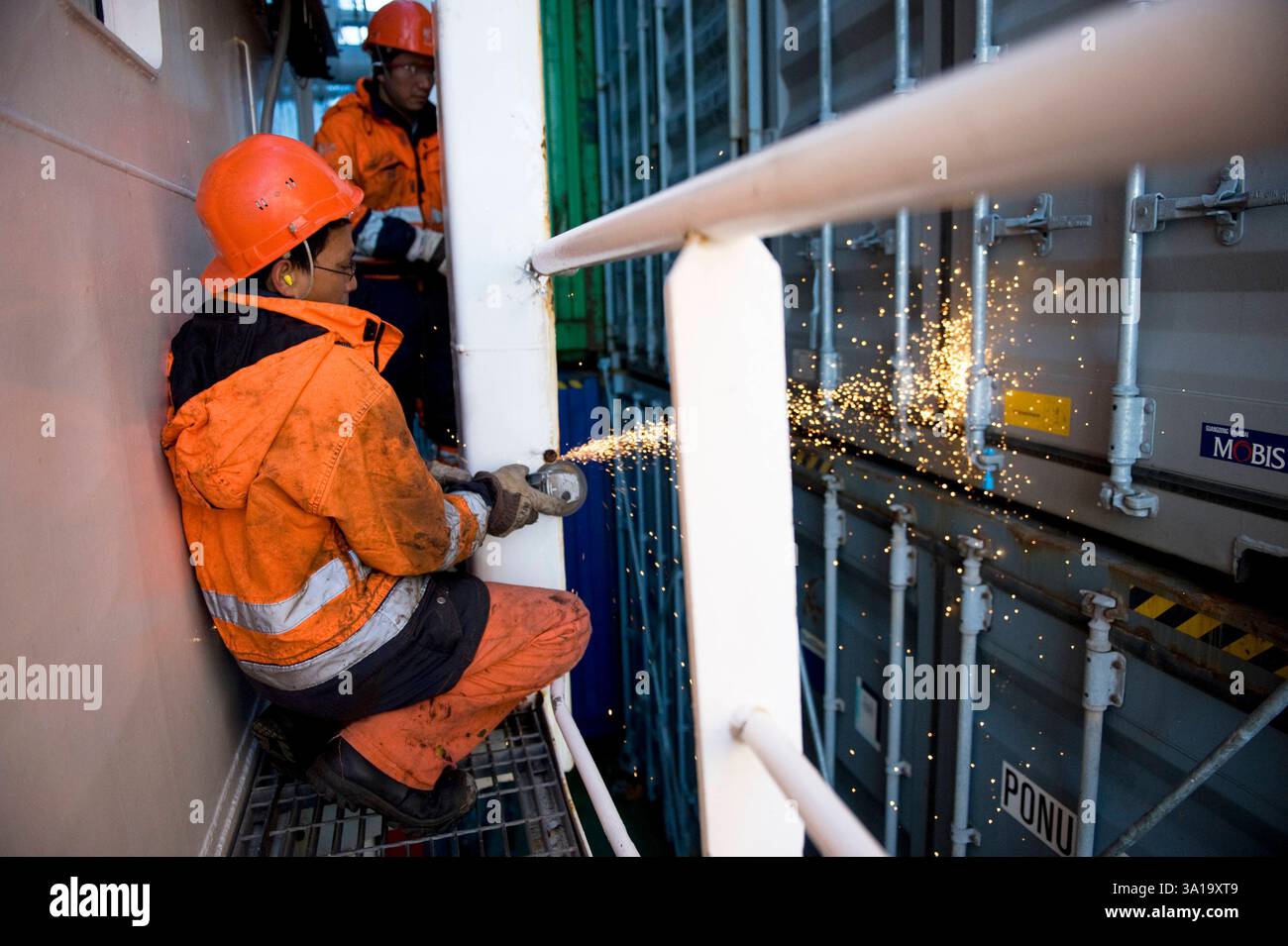 Able Seaman / Seafareer doing Maintenance. Asian Seafarer / Able Seaman ...