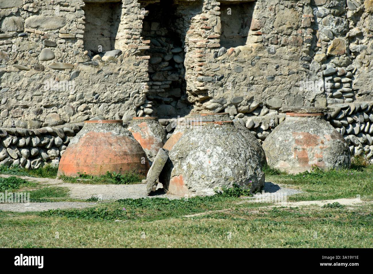 Ancient wine jugs on the grounds of Svetitskhoveli Cathedral, UNESCO ...