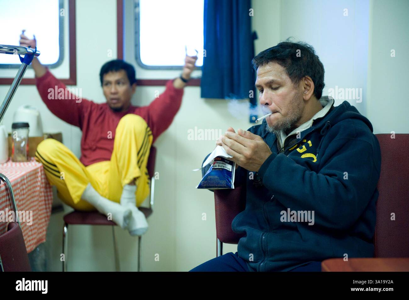 Chef in Ship s Kitchen. Two Seafarers / Able Seaman relaxing inside MS ...