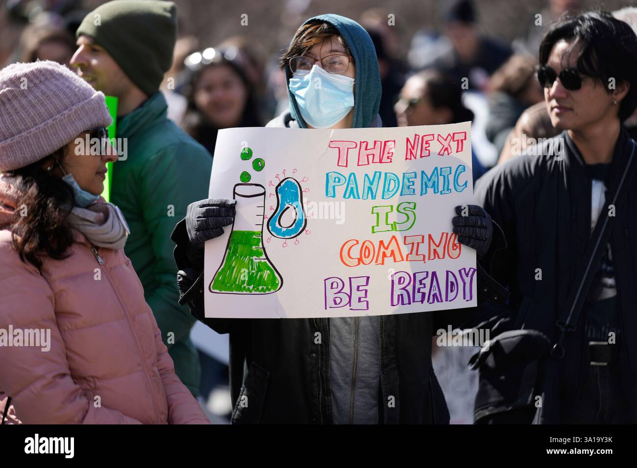 People participate in a "Stand Up for Science" rally in New York ...