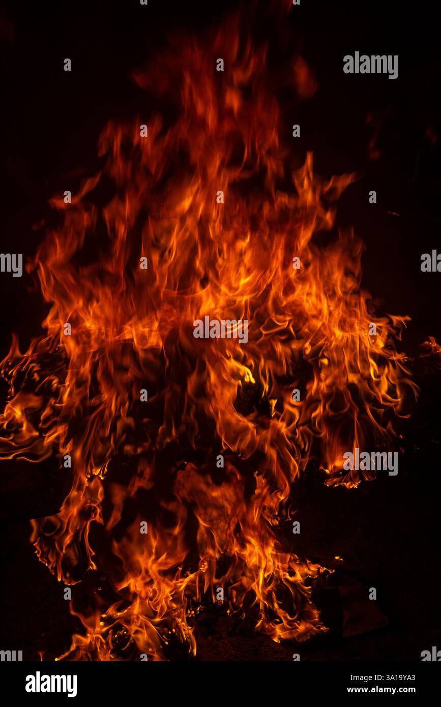 Fire flame background. Hell bonfire. Texture of fire on a black ...