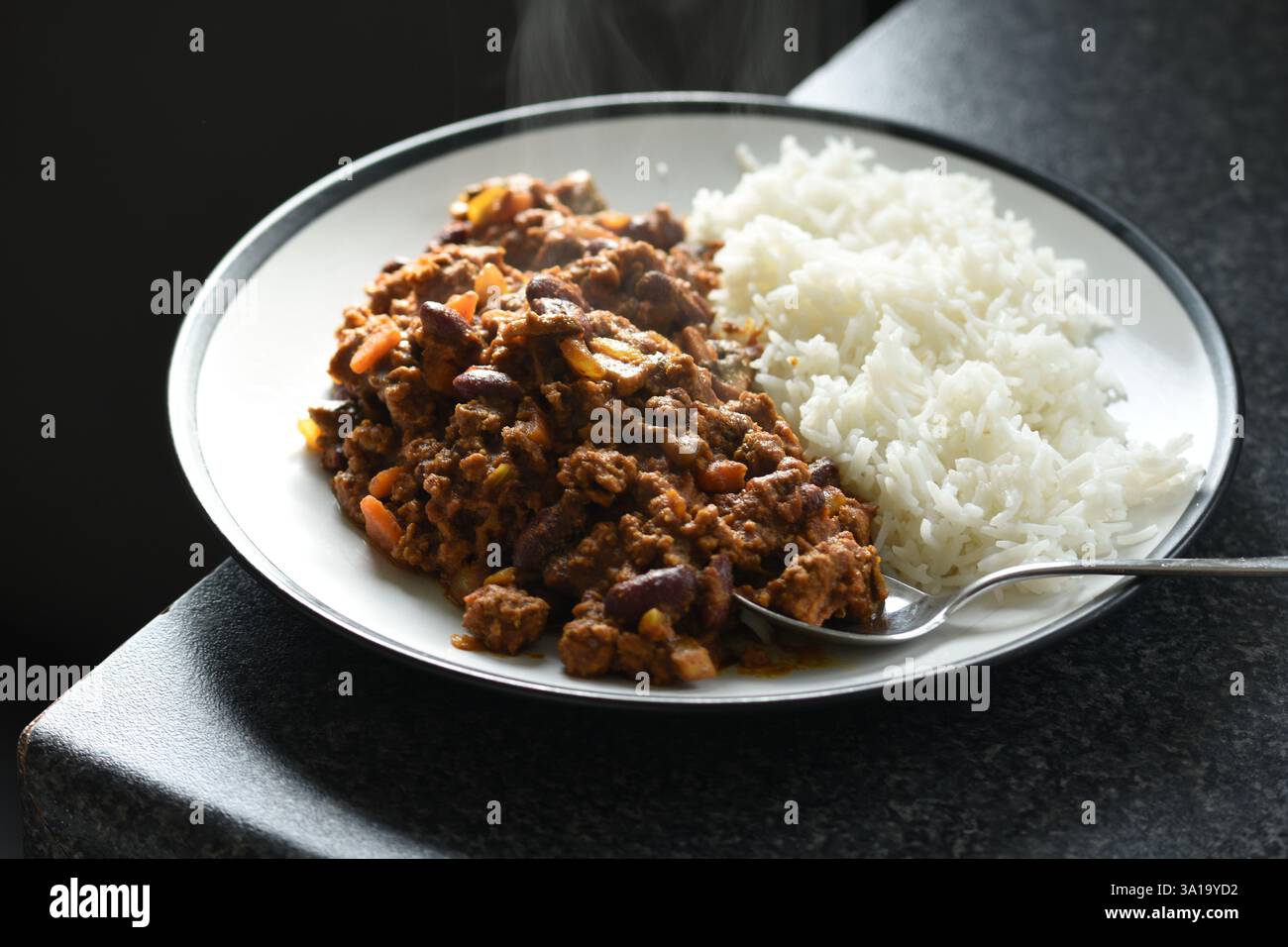 Chili con carne with basmati rice Stock Photo - Alamy