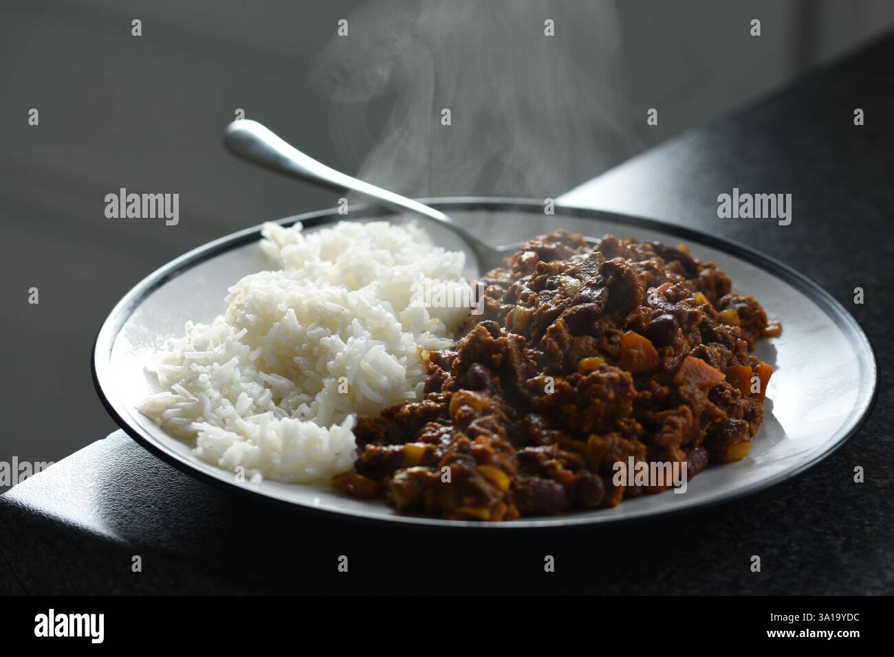 Chili con carne with basmati rice Stock Photo - Alamy