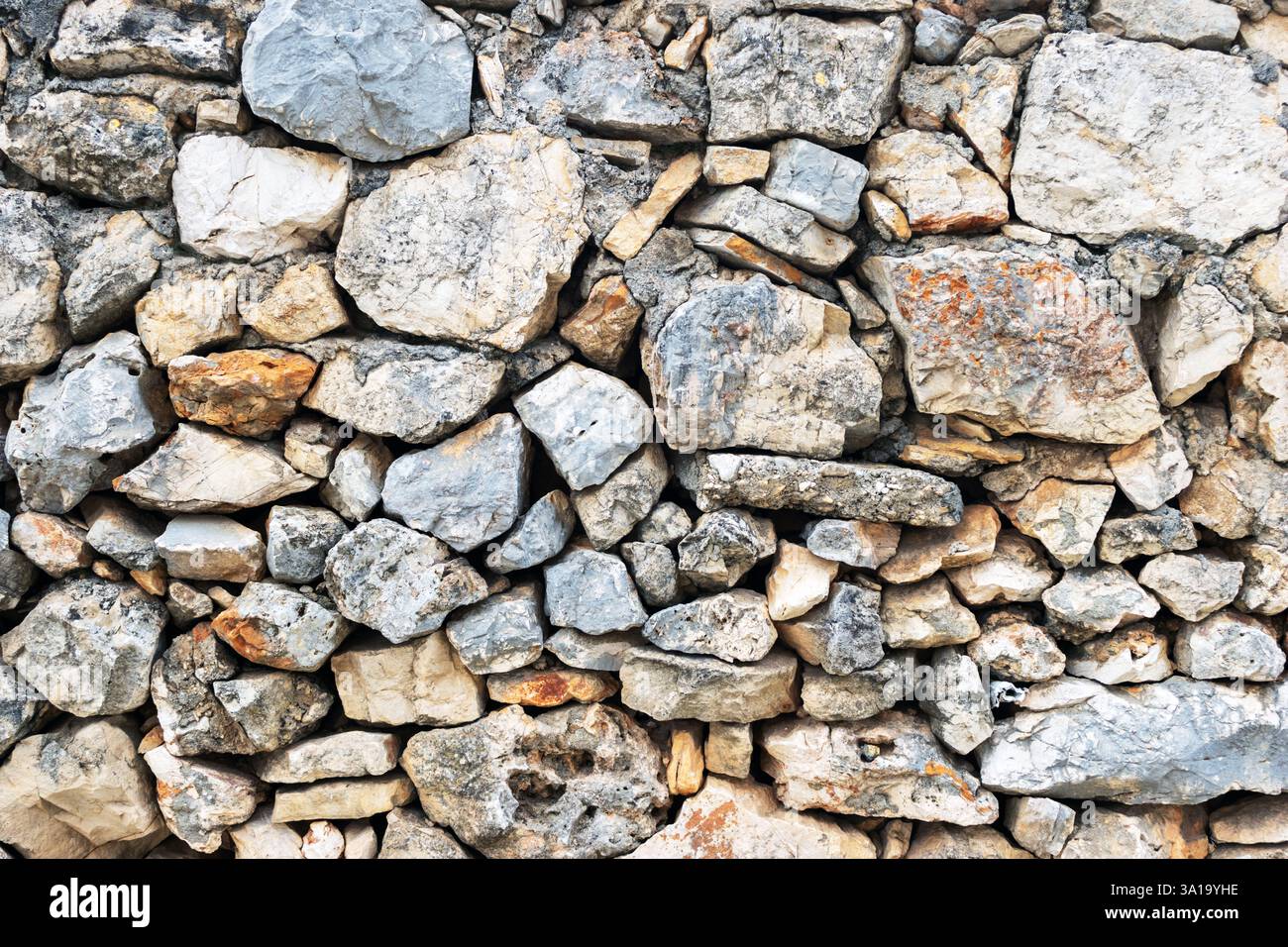 Rocky horizontal wallpaper of stone with texture in rust tones. Closeup ...