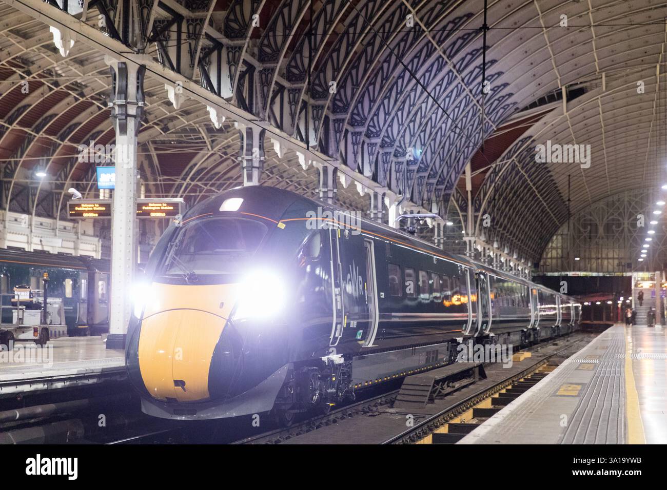 GWR train at Paddington Station, London. Modern train arriving at ...