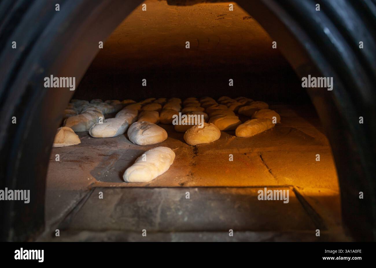 Daily production of bread baked with wood oven with traditional method ...