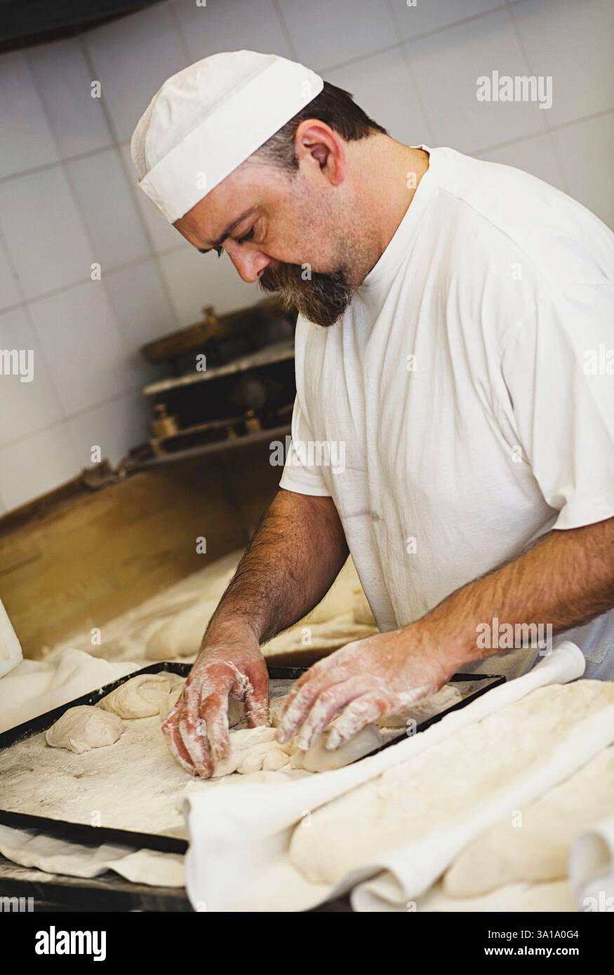 Daily production of bread baked with wood oven with traditional method ...