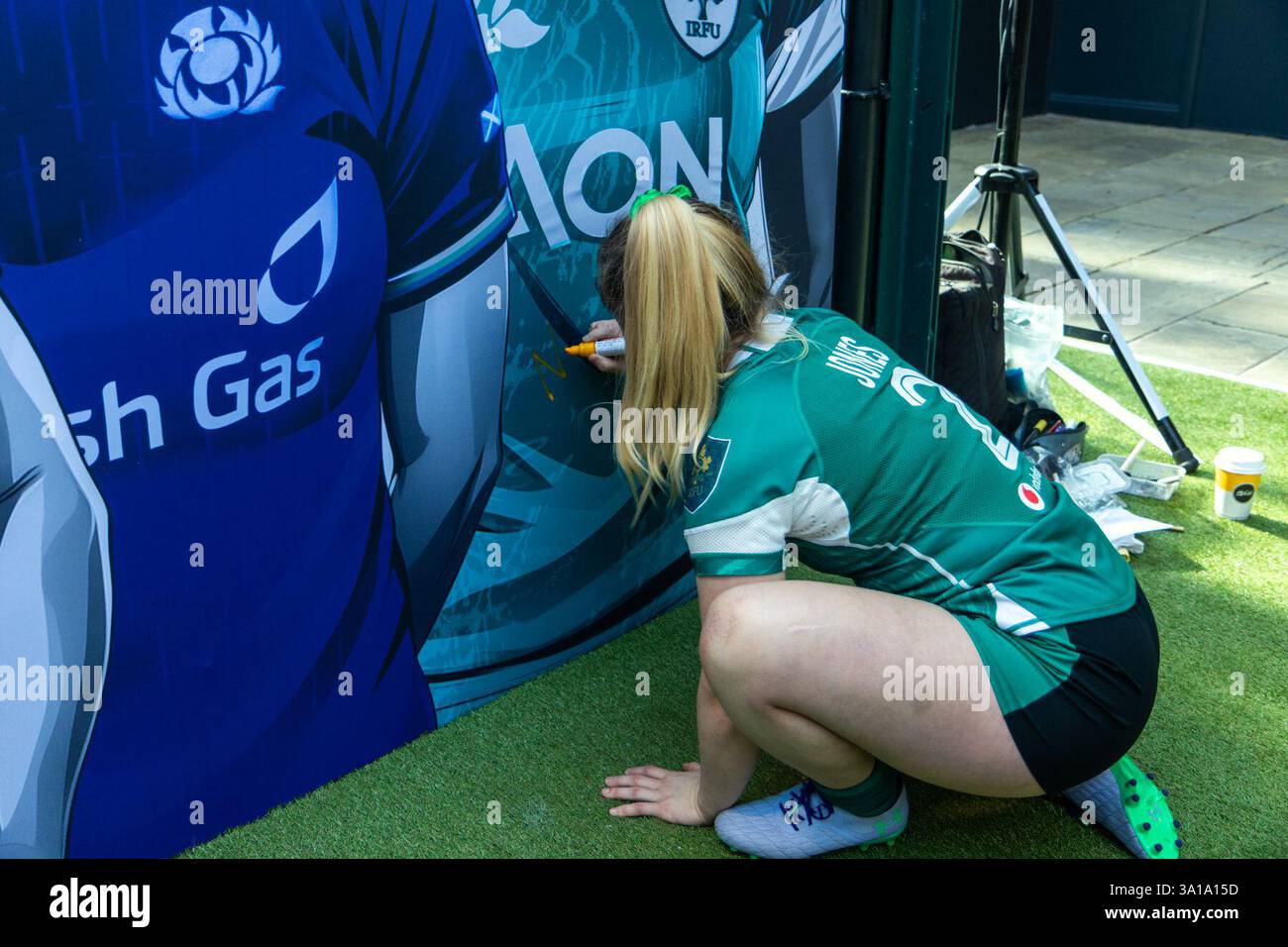 London, UK. 7th Mar, 2025. Neve Jones (Ireland IRFU) signing her mural ...