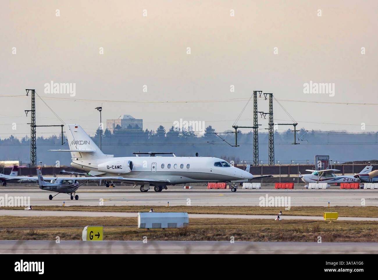 Stuttgart Airport STR EDDS mit Flugzeug. Taxiway. D-CAMC, Cessna 680A ...