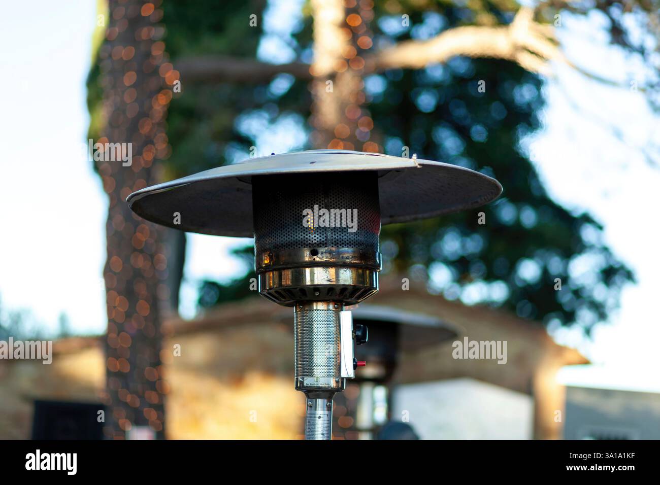 Outdoor heater providing warmth hi-res stock photography and images - Alamy