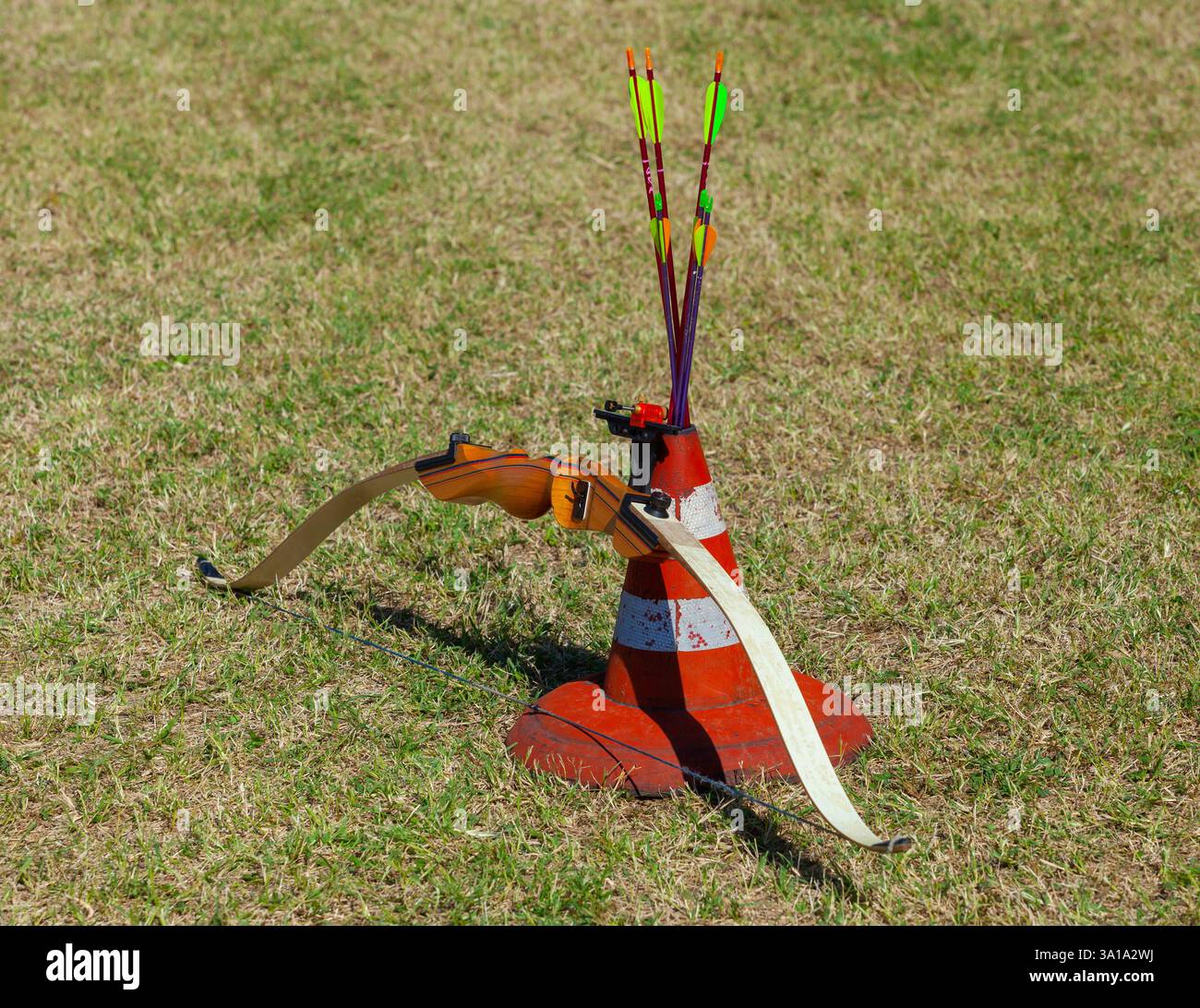 Bow and arrow in a cone, during an archery lesson Stock Photo - Alamy