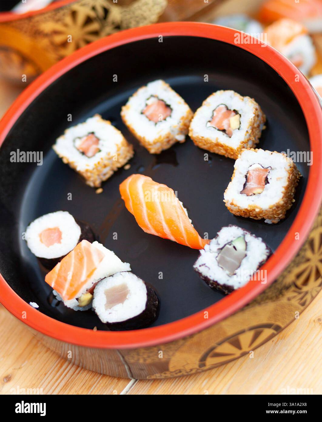 Japanese sushi on a rustic background. Sushi rolls, nigiri and maki ...