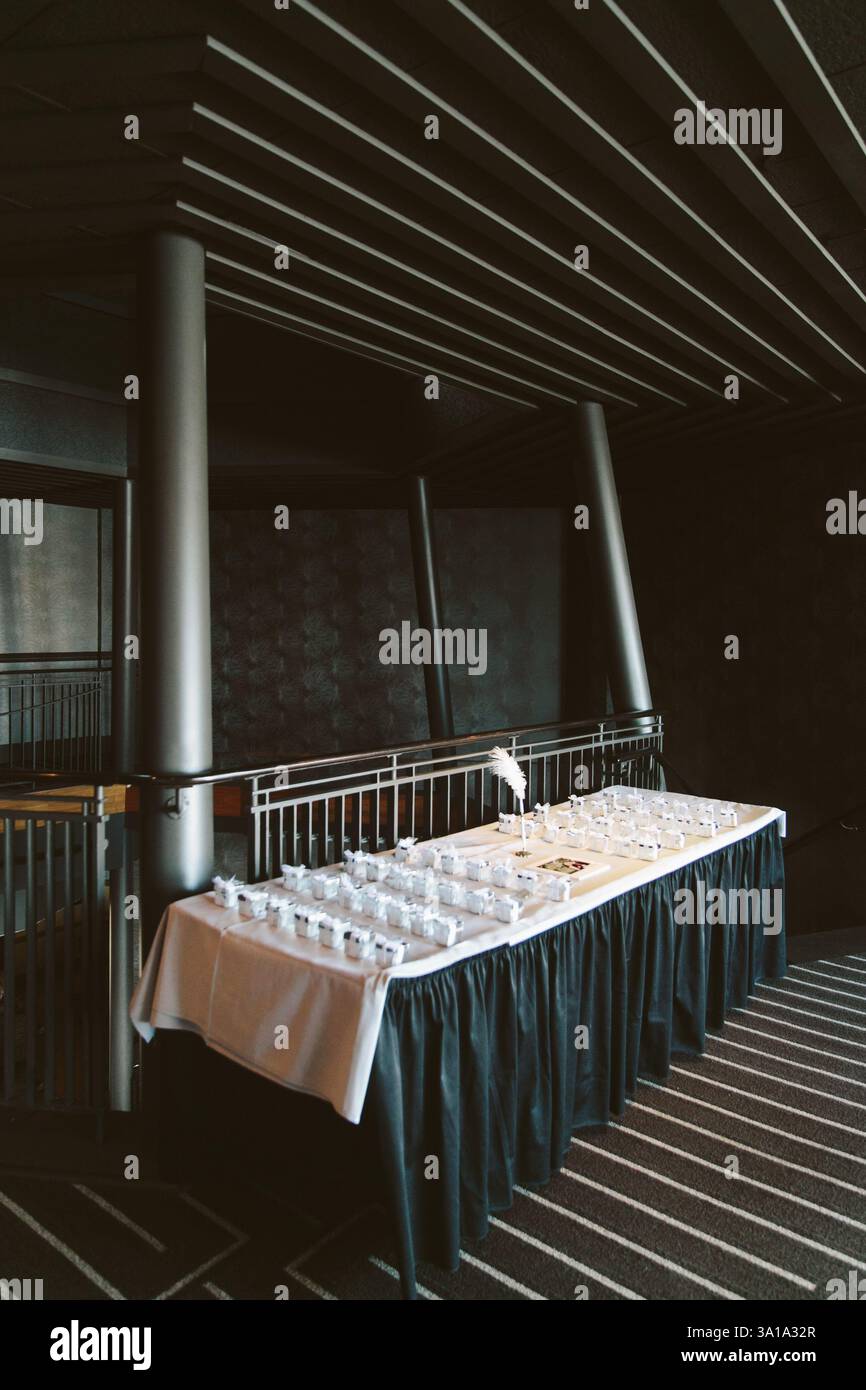 A modern restaurant showcases an elegantly dressed table with glassware ...