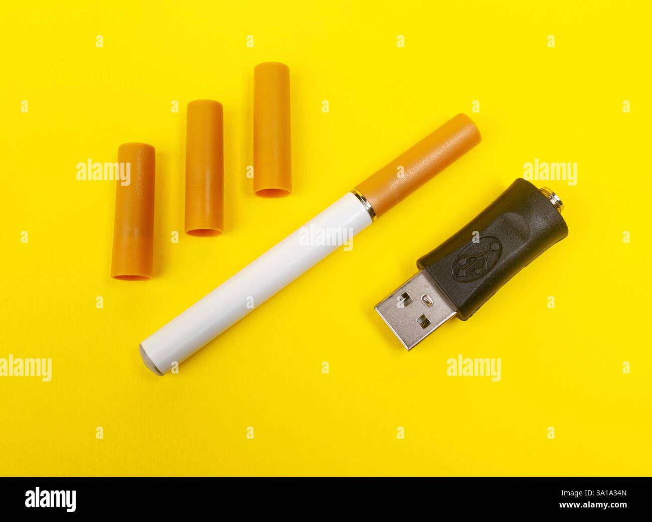 Close up photo of an electronic cigarette on yellow background Stock ...