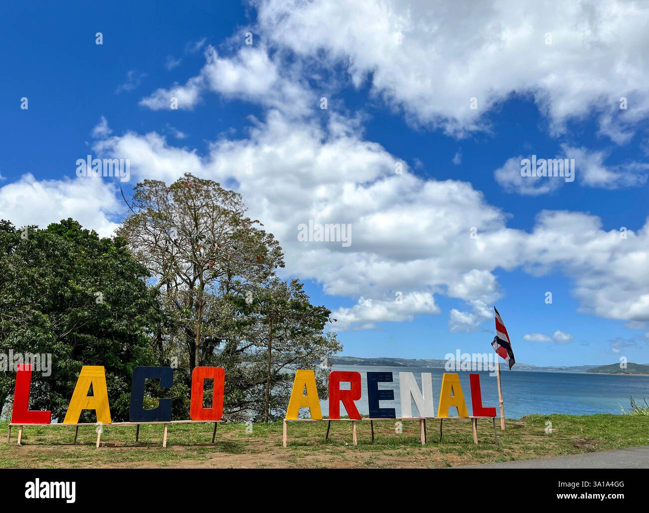 Lake Arenal in Costa Rica with colorful letter sign Stock Photo - Alamy