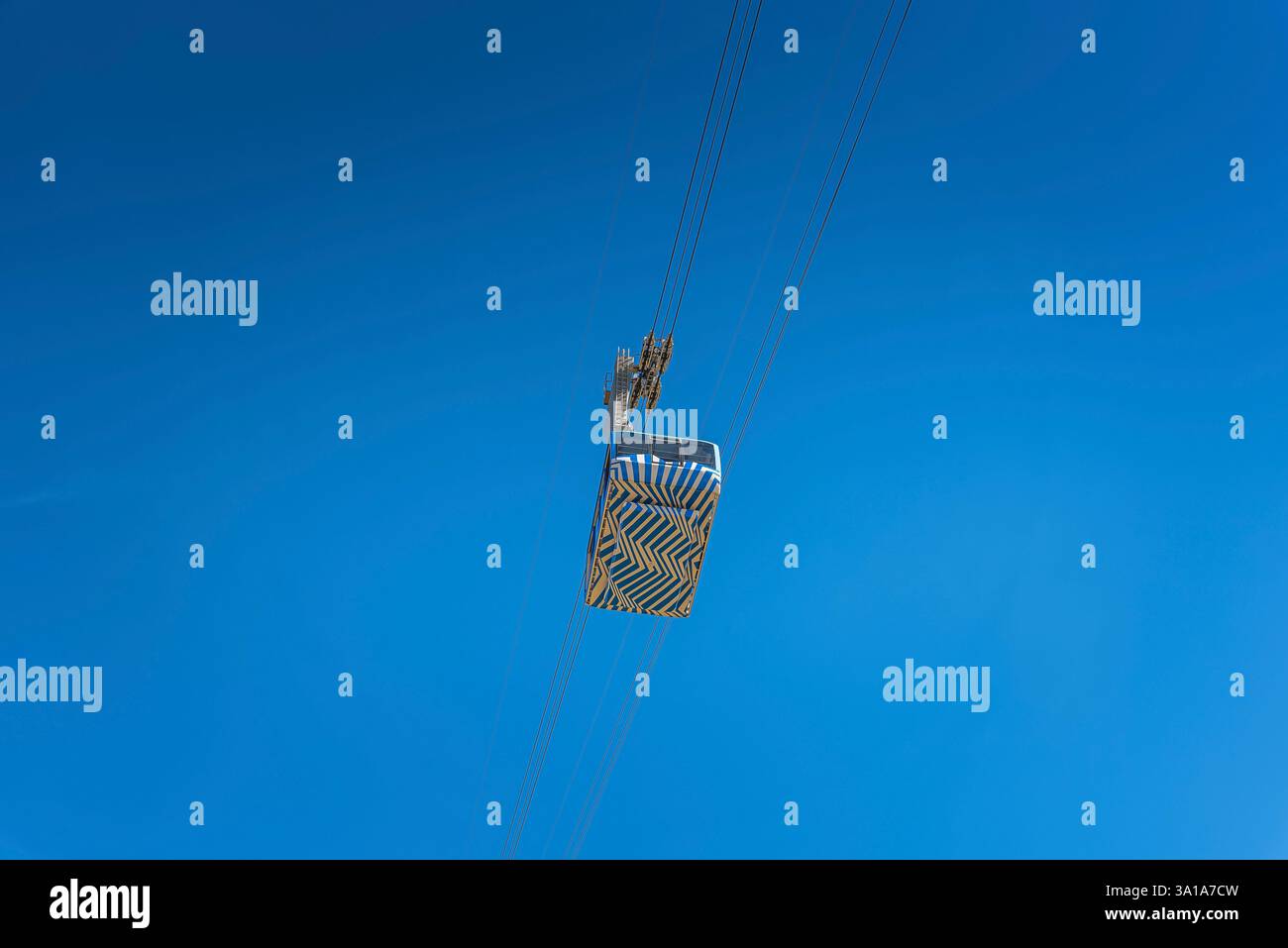 The gondola of the cable car to Säntis in front of a blue sky, view ...