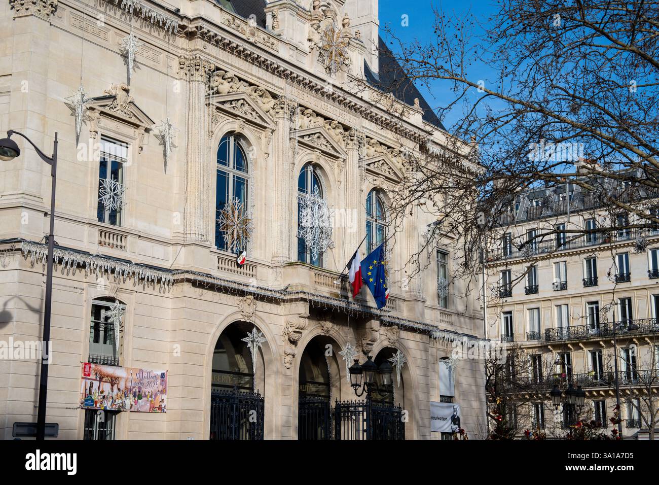 Majestic winter decorations adorn the historic city hall in Paris on a ...