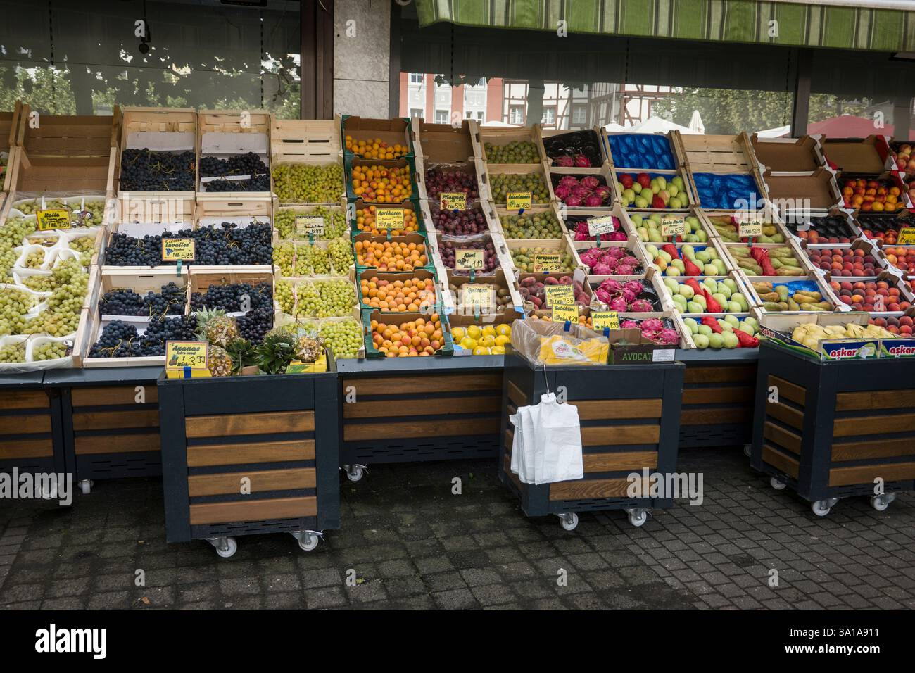 Large selection of fruit in front of a fruit and vegetable store Stock ...