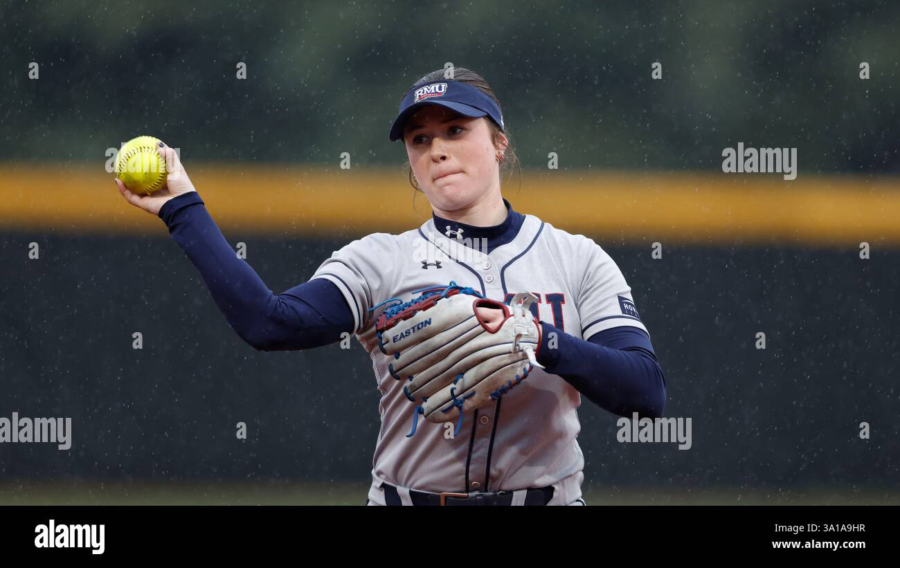Robert Morris infielder Mary Brant throws before an NCAA softball game ...