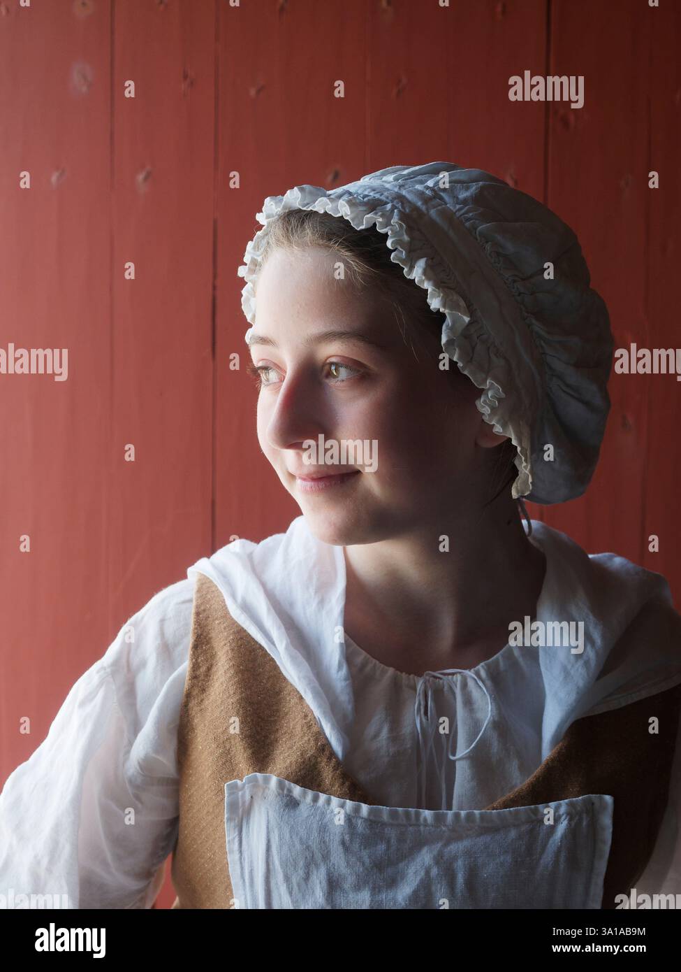 Young woman in historical costume as waitress in a restaurant hi-res ...