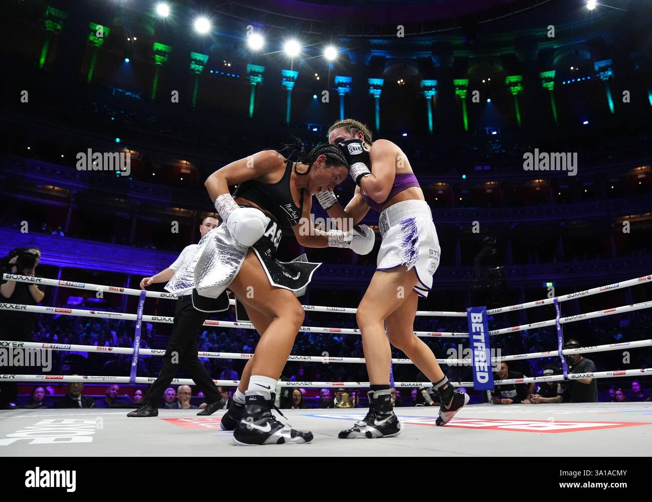 Jasmina Zapotoczna (left) and Chloe Watson in the EBU European Fly weight bout at the Royal ...