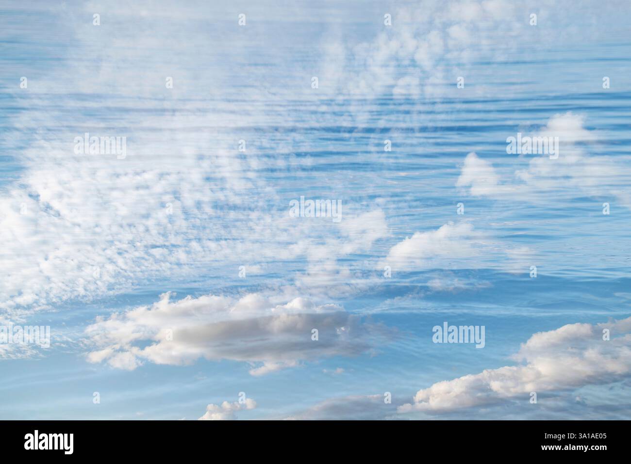 Double exposure water and sky with clouds Stock Photo - Alamy
