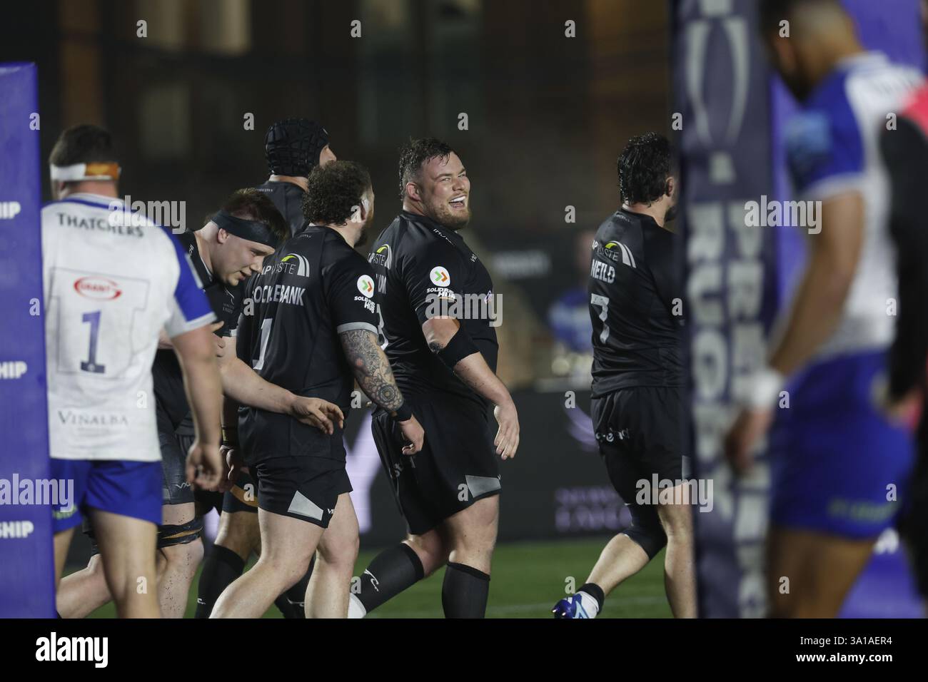 Murray McCallum of Newcastle Falcons grins after scoring during the ...