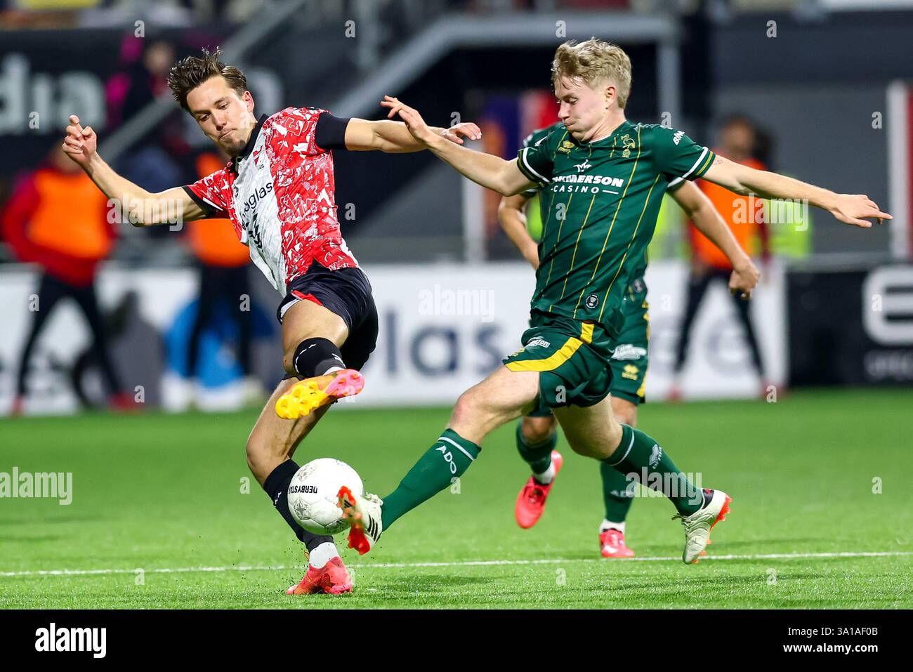 EMMEN, NETHERLANDS - MARCH 7: Dennis Vos of FC Emmen battles for the ...