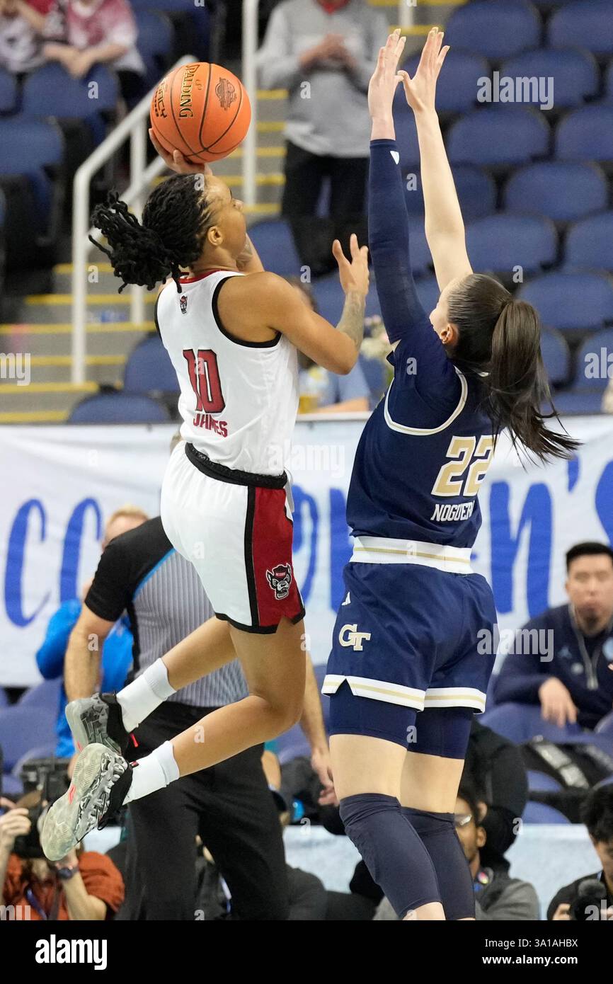 North Carolina State guard Aziaha James (10) shoots over Georgia Tech ...