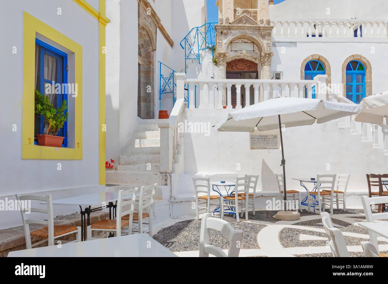 The picturesque main square of Nikia village, Nikia, Nisyros Island ...