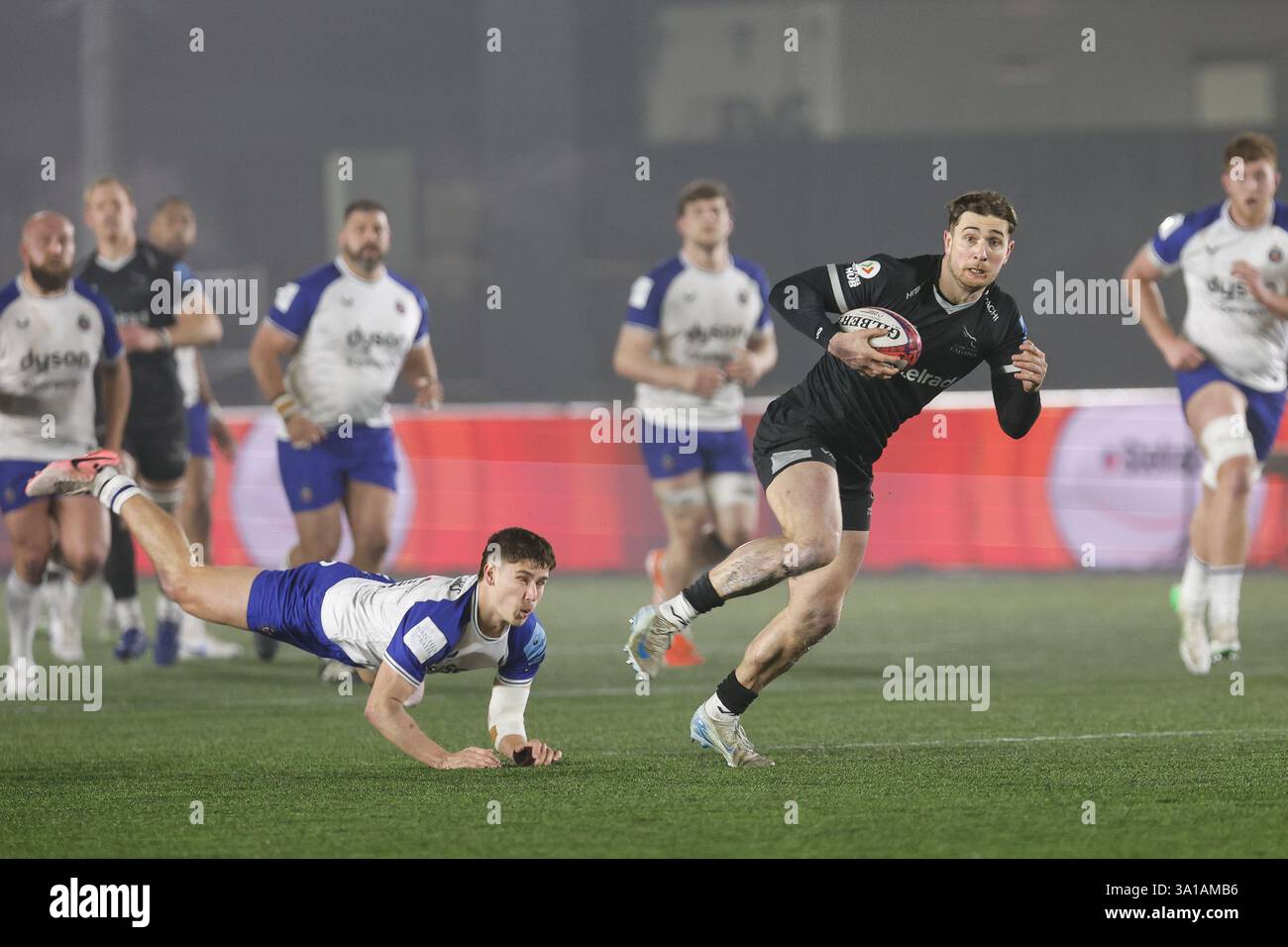 Ben Stevenson of Newcastle Falcons breaks clear after a chip ahead to ...