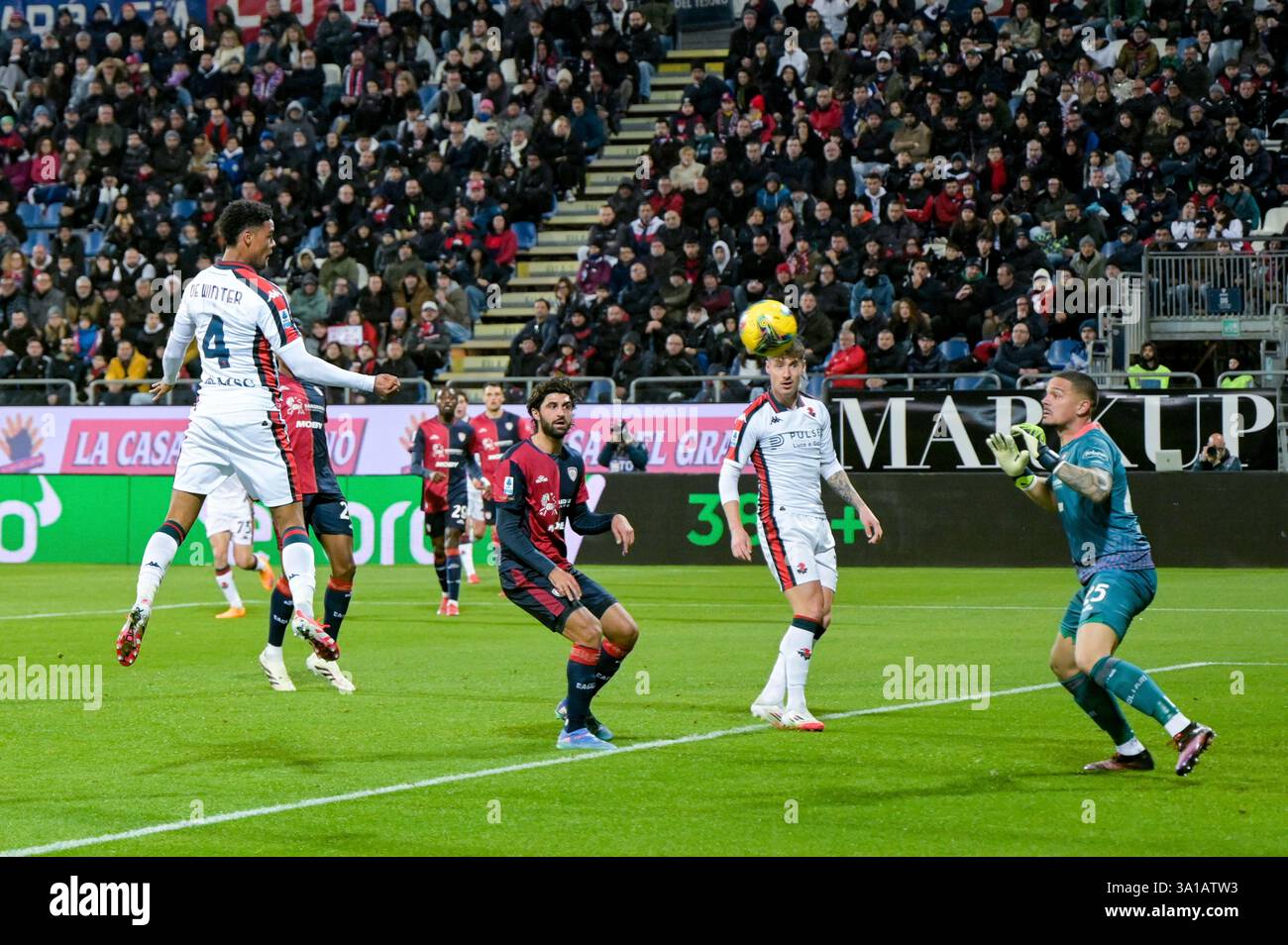 Genoa's Koni De Winter, left, in action during the Serie A soccer match ...
