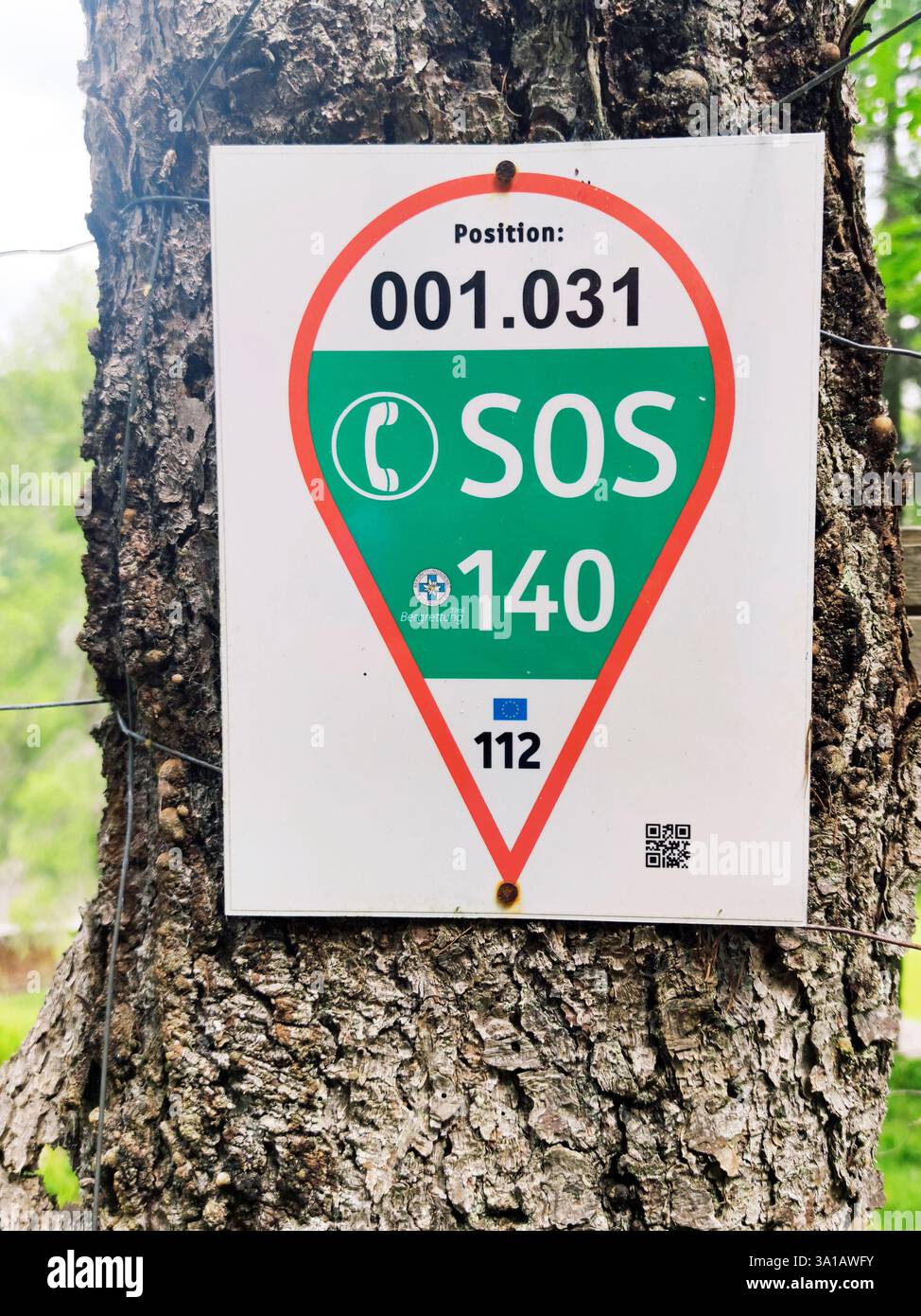Emergency call sign with position and phone number in the forest Stock ...