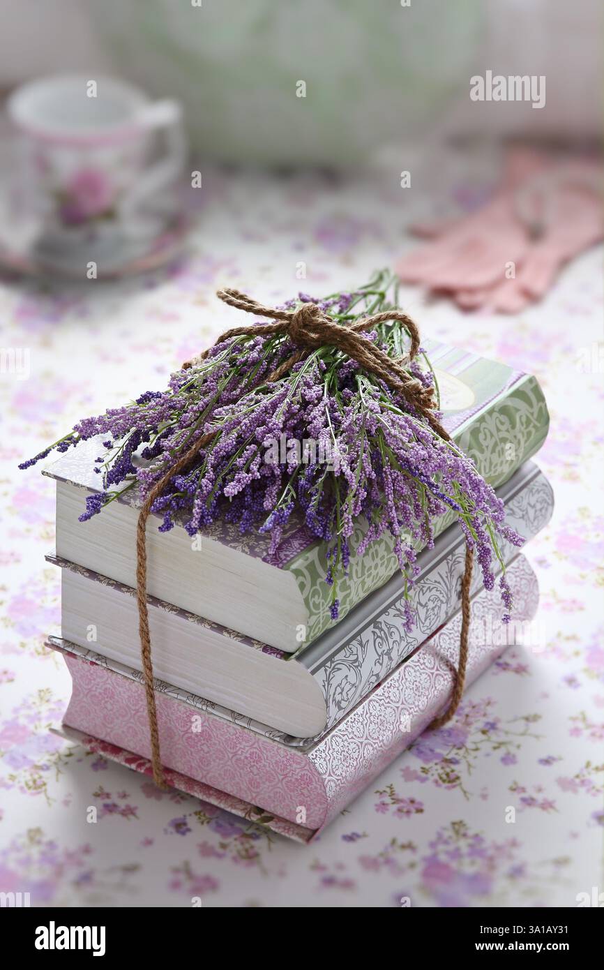 Stacked Victorian Books with Lavender Flowers Stock Photo - Alamy