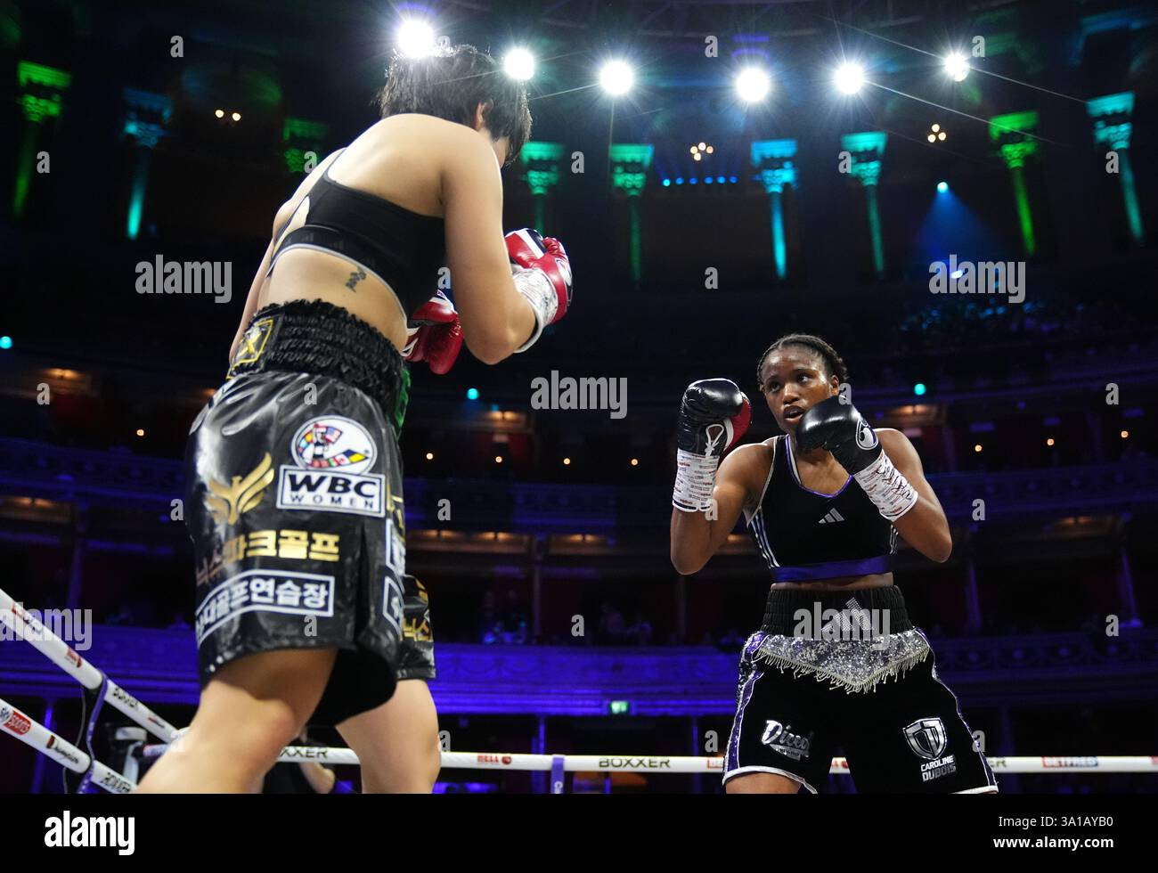 Bo Mi Re Shin (left) and Caroline Dubois in the WBC World Light weight bout at the Royal Albert ...