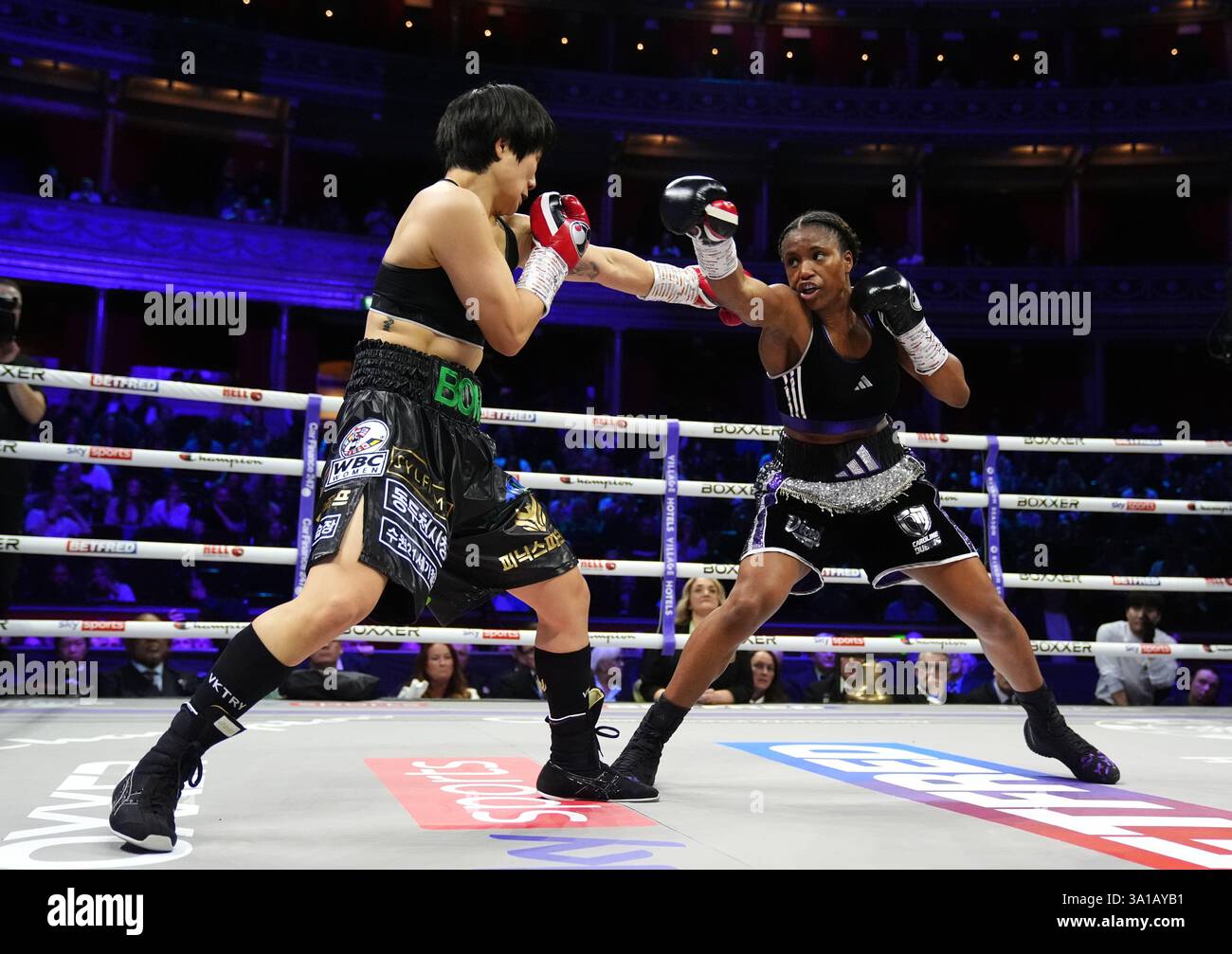 Bo Mi Re Shin (left) and Caroline Dubois in the WBC World Light weight bout at the Royal Albert ...