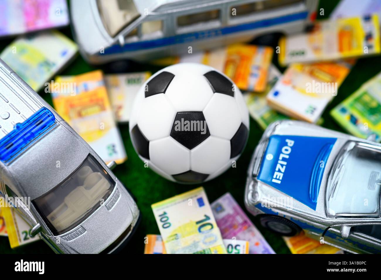 Soccer with police vehicles and banknotes hi-res stock photography and ...