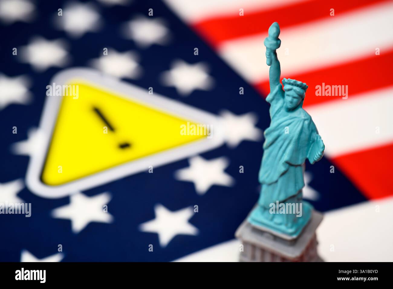 Statue of liberty on us flag with warning sign hi-res stock photography ...