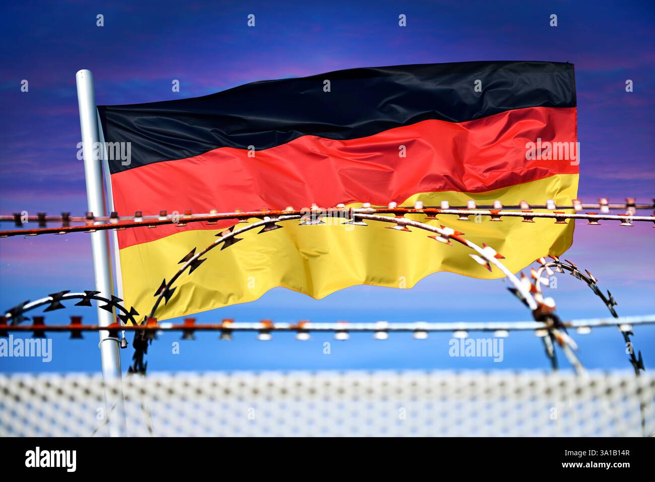 German flag in front of barbed wire hi-res stock photography and images ...