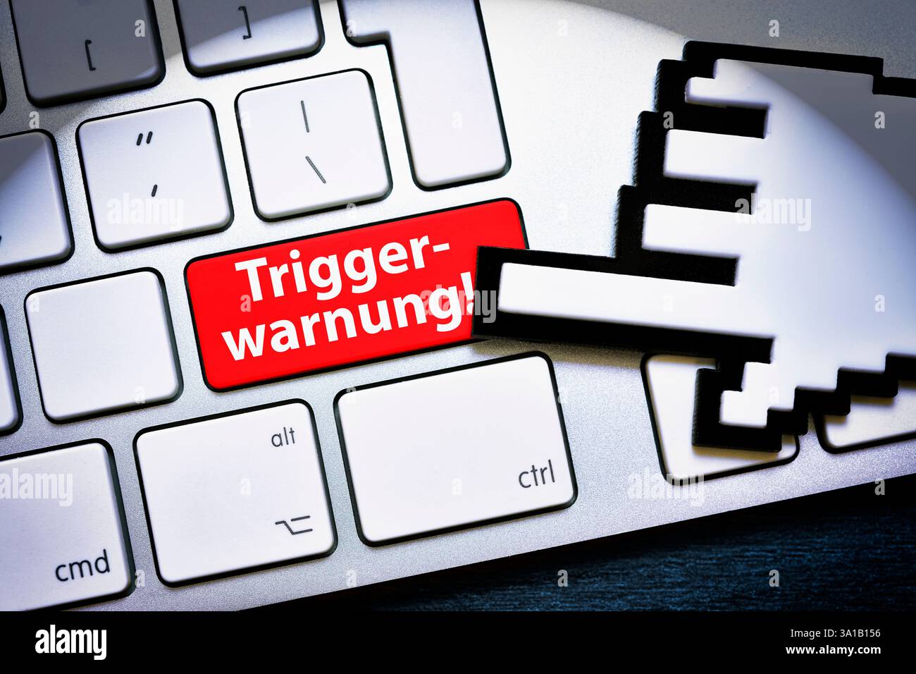 Computer button labeled Trigger warning!, [M] Stock Photo - Alamy