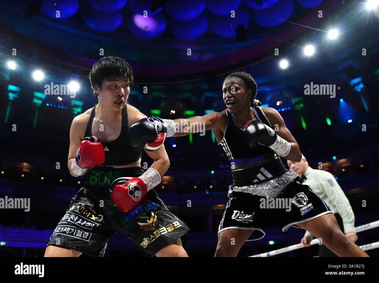 Bo Mi Re Shin (left) and Caroline Dubois in the WBC World Light weight bout at the Royal Albert ...