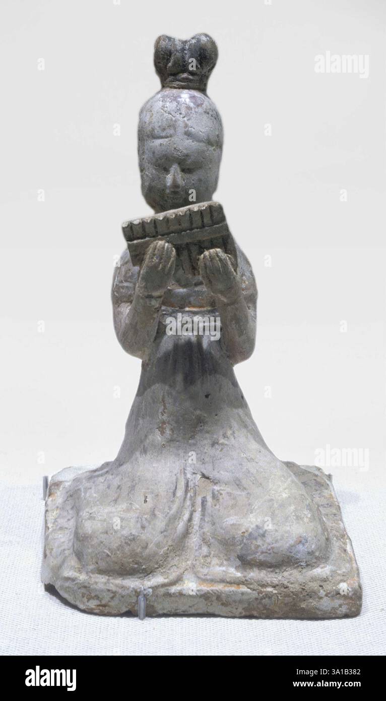 Seated pan-pipe player, about 650 Stock Photo - Alamy