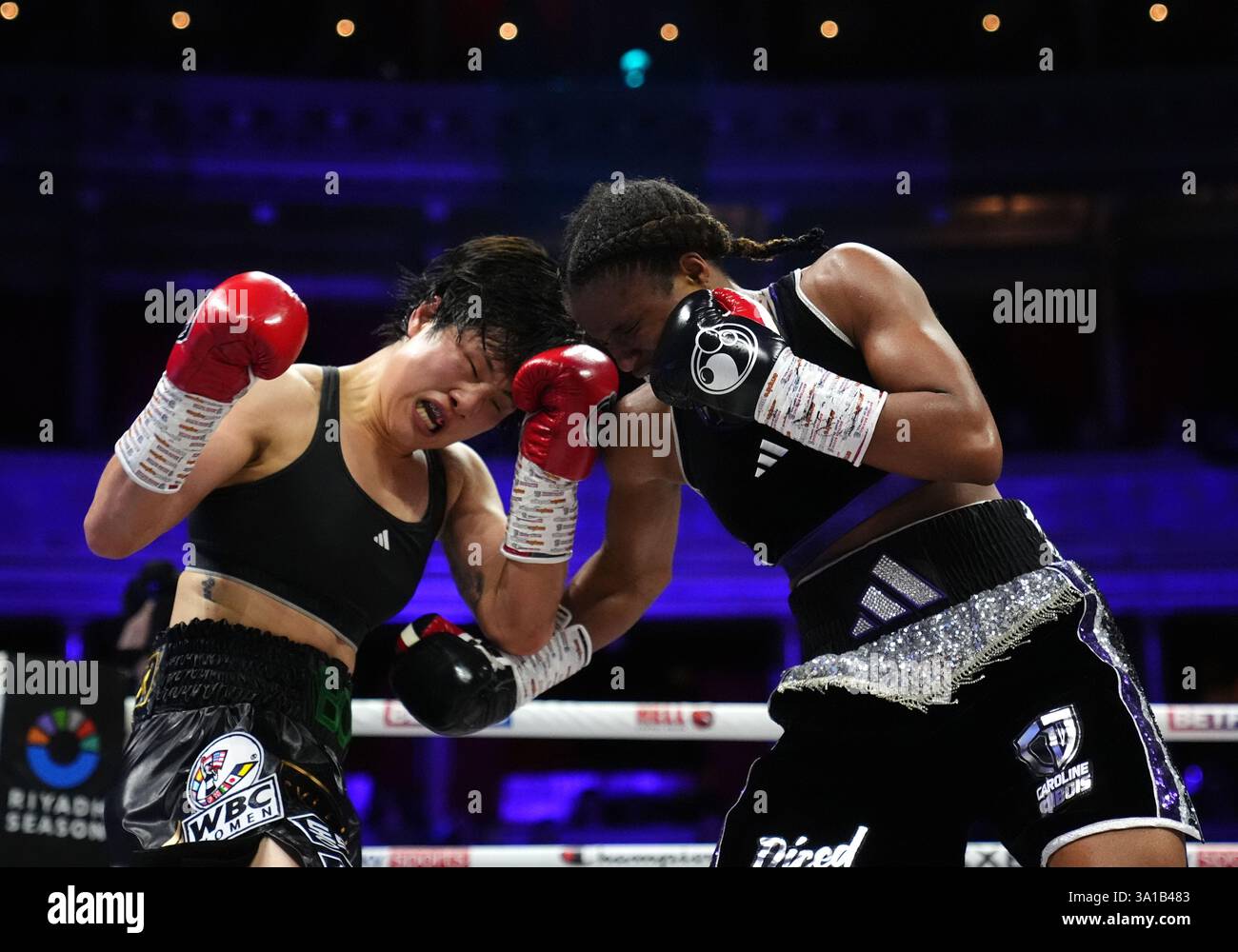 Bo Mi Re Shin (left) and Caroline Dubois in the WBC World Light weight bout at the Royal Albert ...