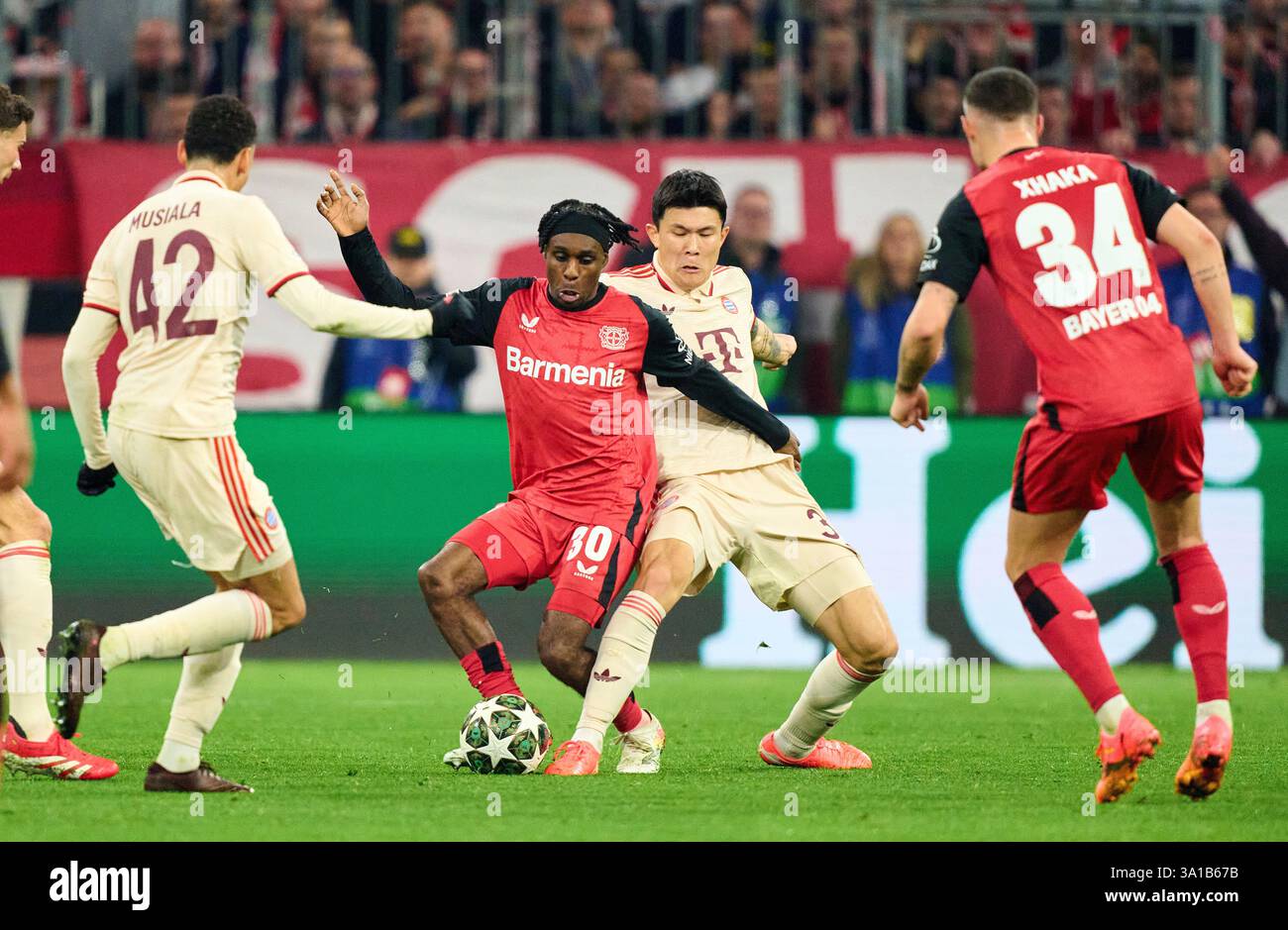 Munich, Germany. 05th Mar, 2025. MinJae Kim, Min-Jae Kim, FCB 3 Jamal MUSIALA, FCB 42 compete ...