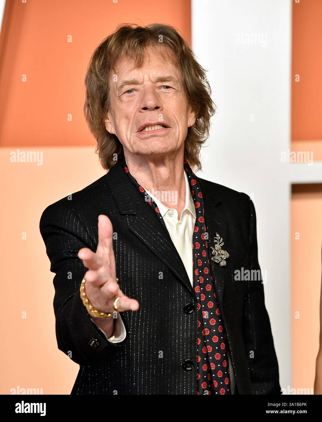 Mick Jagger arrives at the Vanity Fair Oscar Party on Sunday, March 2 ...