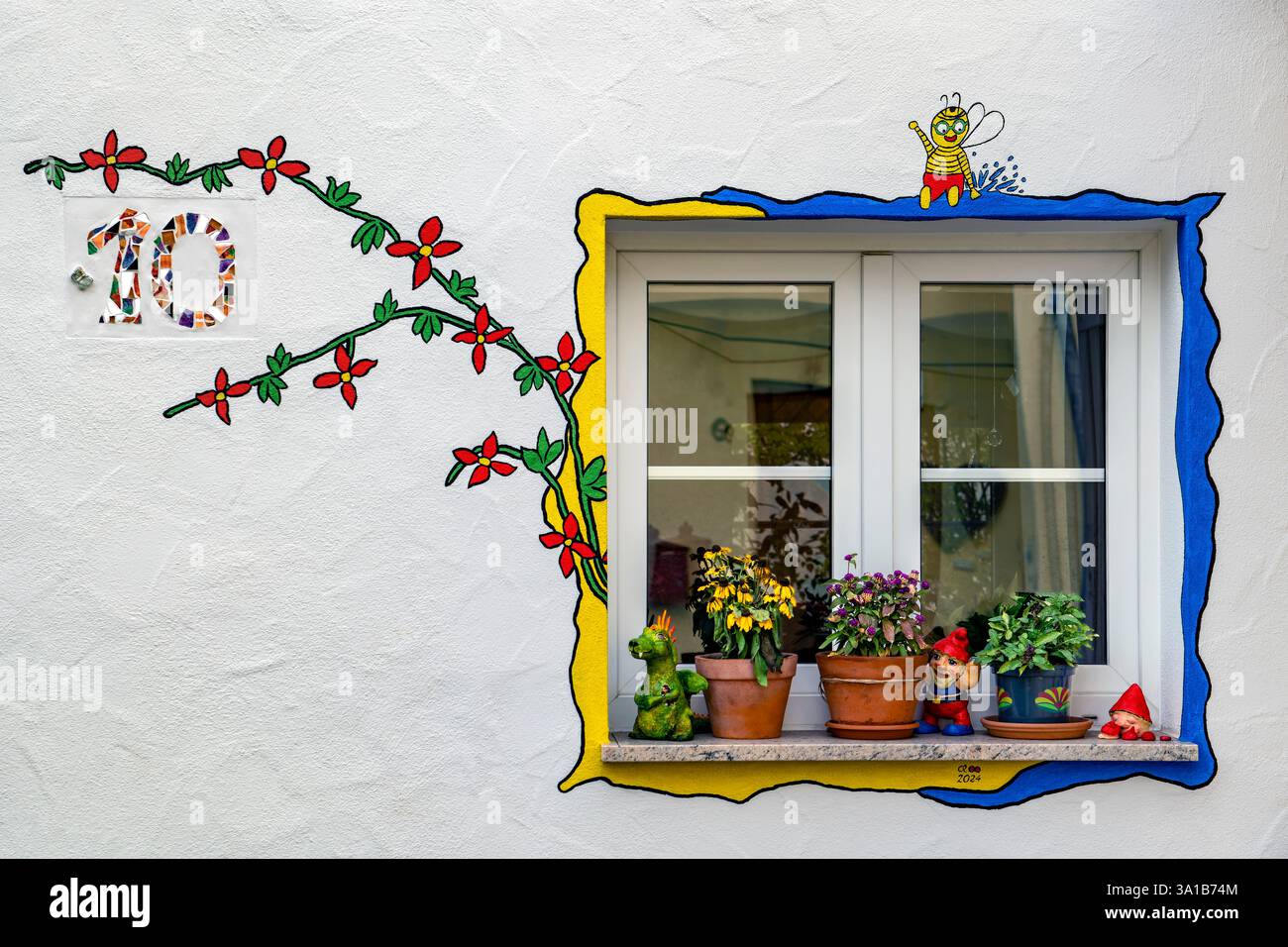 Colorful, fairytale window design in the outdoor area Stock Photo - Alamy