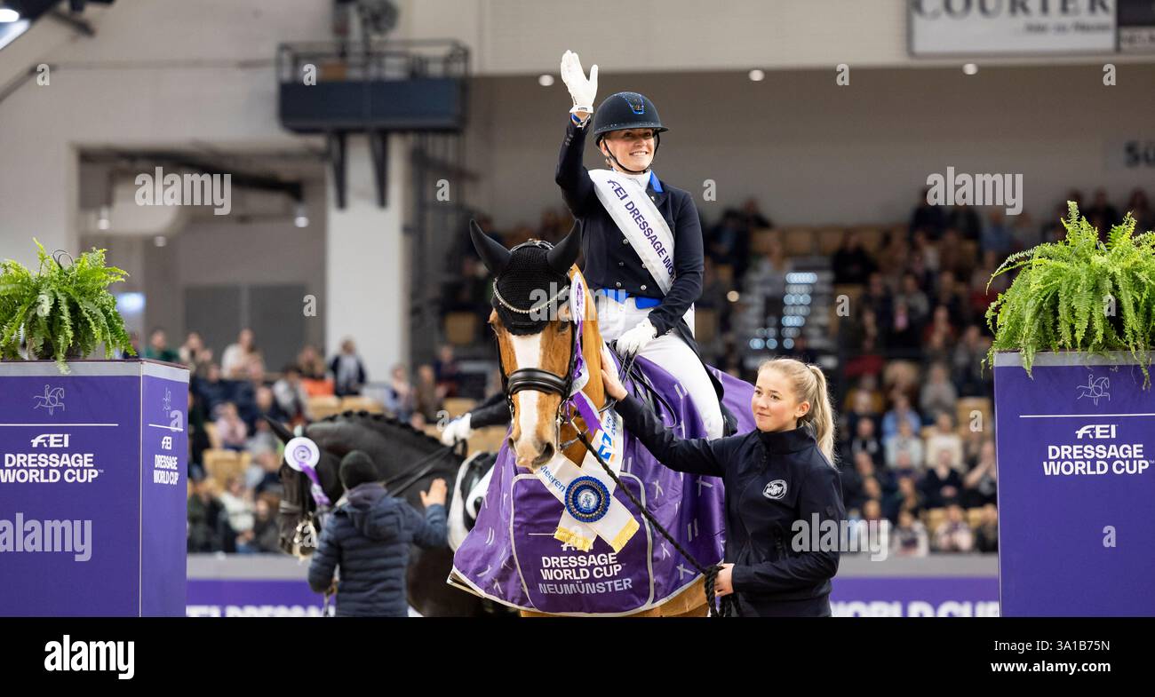 Dressage rider Nanna Skodborg Merrald (DEN) with her horse Blue Hors Zepter and attendant at the ...