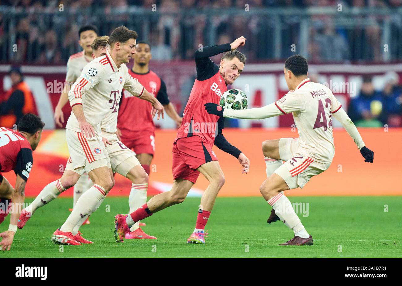 Munich, Germany. 05th Mar, 2025. Florian Wirtz, Lev 10 compete for the ball, tackling, duel ...